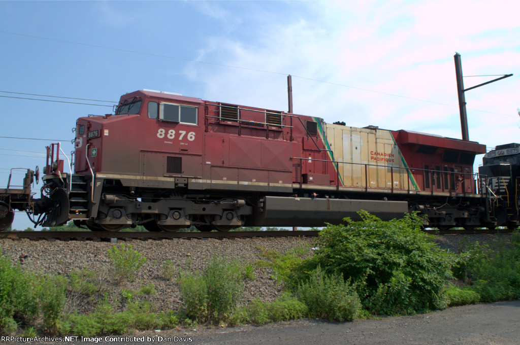 CP ES44AC 8876 former 2010 Vancouver Olympics Unit trails on 24K